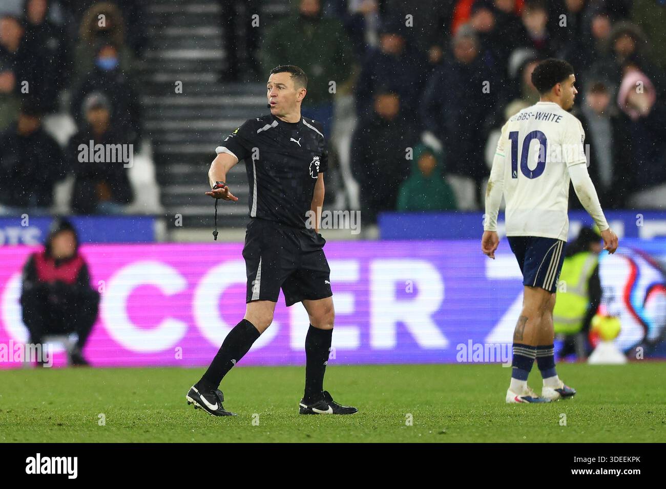 Referee Tony Harrington gestures during the West Ham United v ...