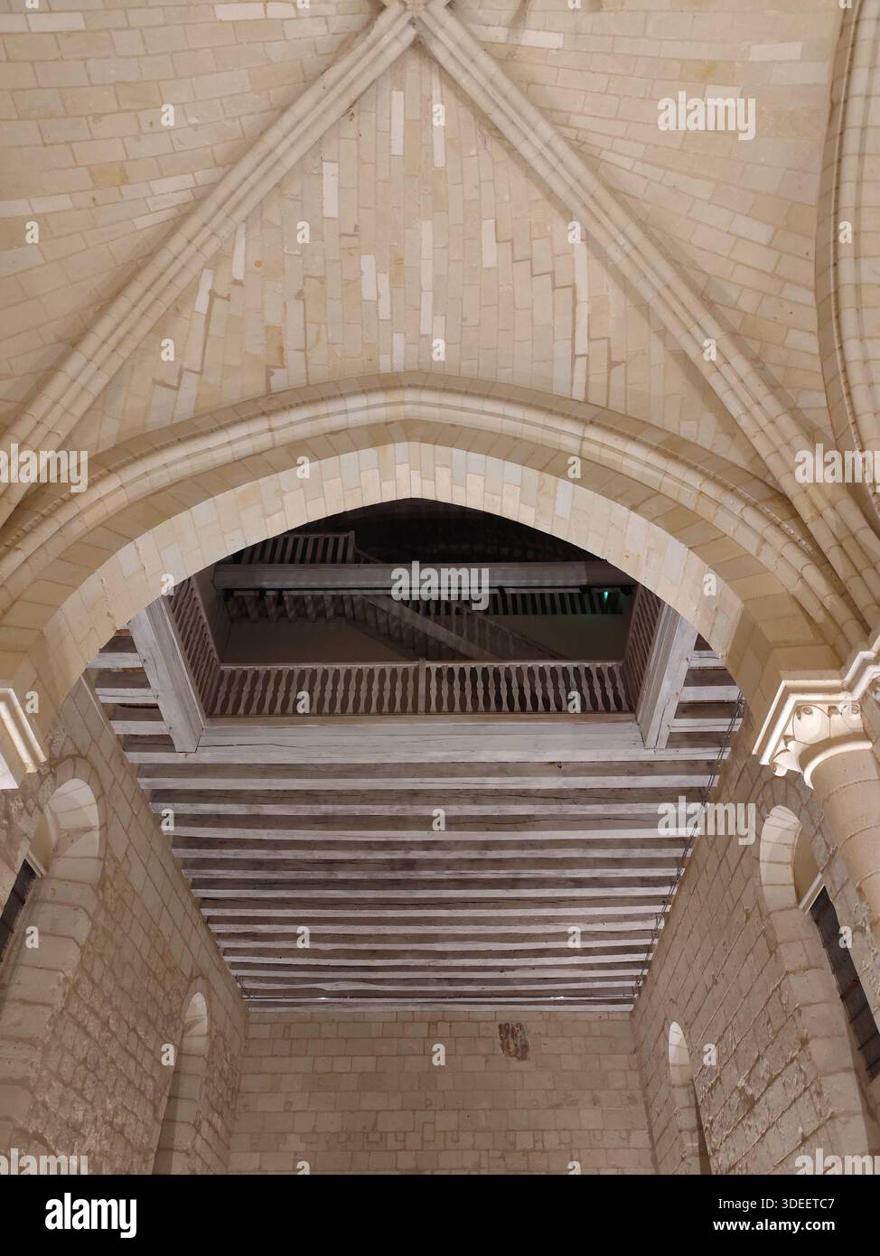 The stone ribbed vault and exposed wound beams of the Chapel of Saint ...