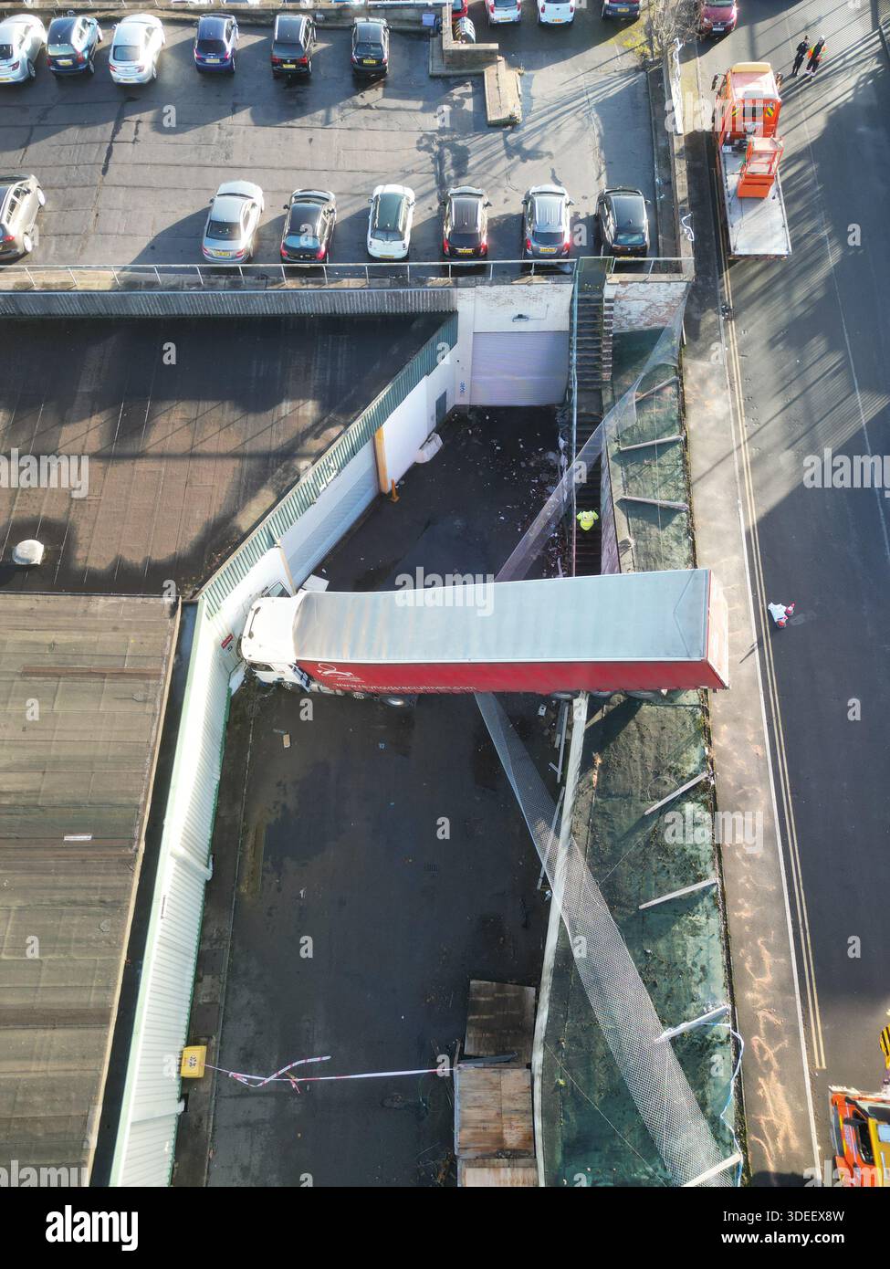 The scene after an articulated lorry got stuck after going through a ...