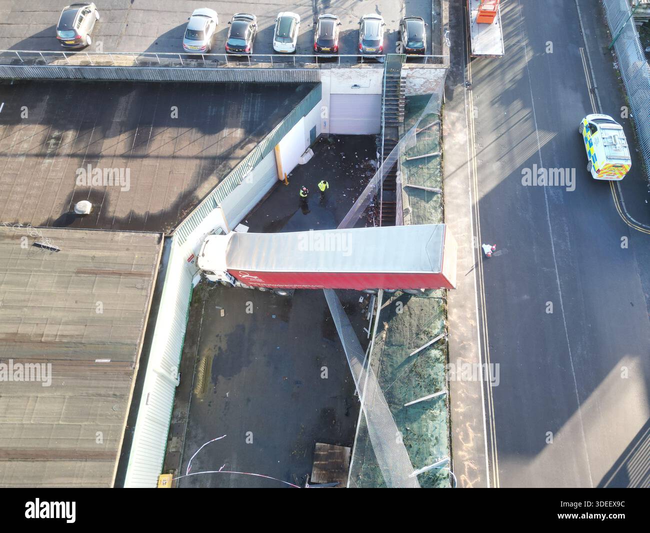 The scene after an articulated lorry got stuck after going through a ...