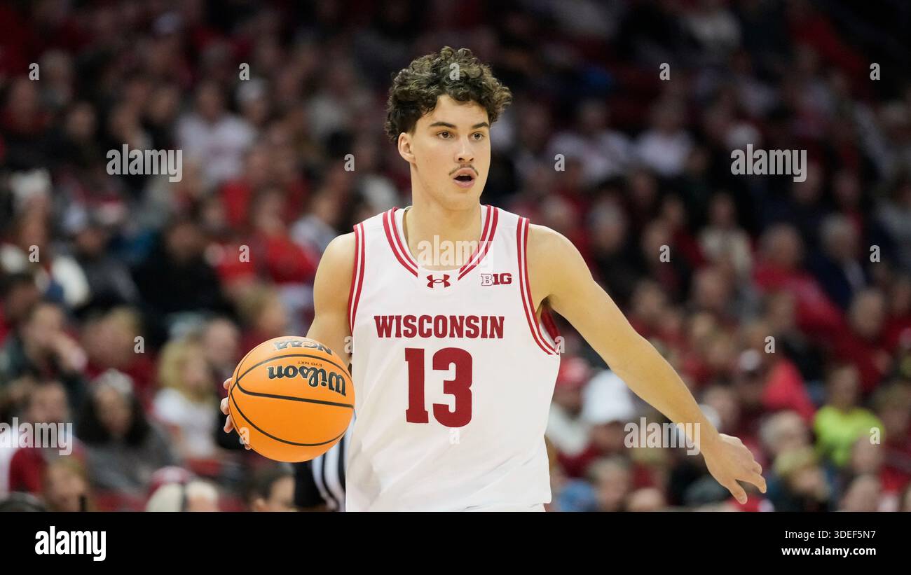 Wisconsin guard Hayden Jones dribbles during the second half of an NCAA ...