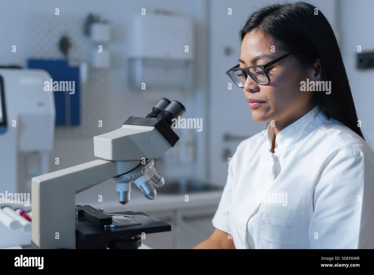 Scientist using microscope in lab hi-res stock photography and images ...