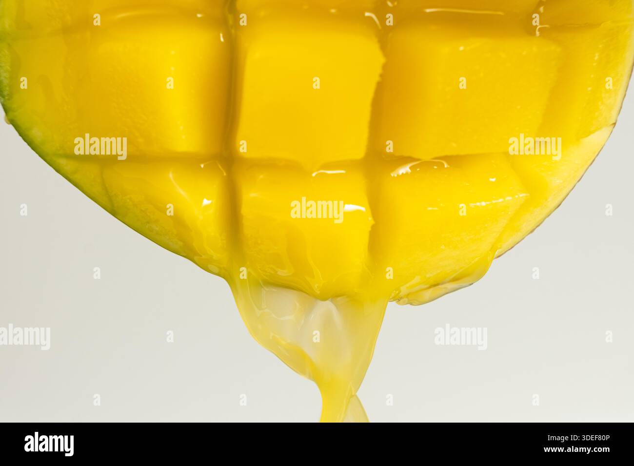Macro mango juice dripping hi-res stock photography and images - Alamy