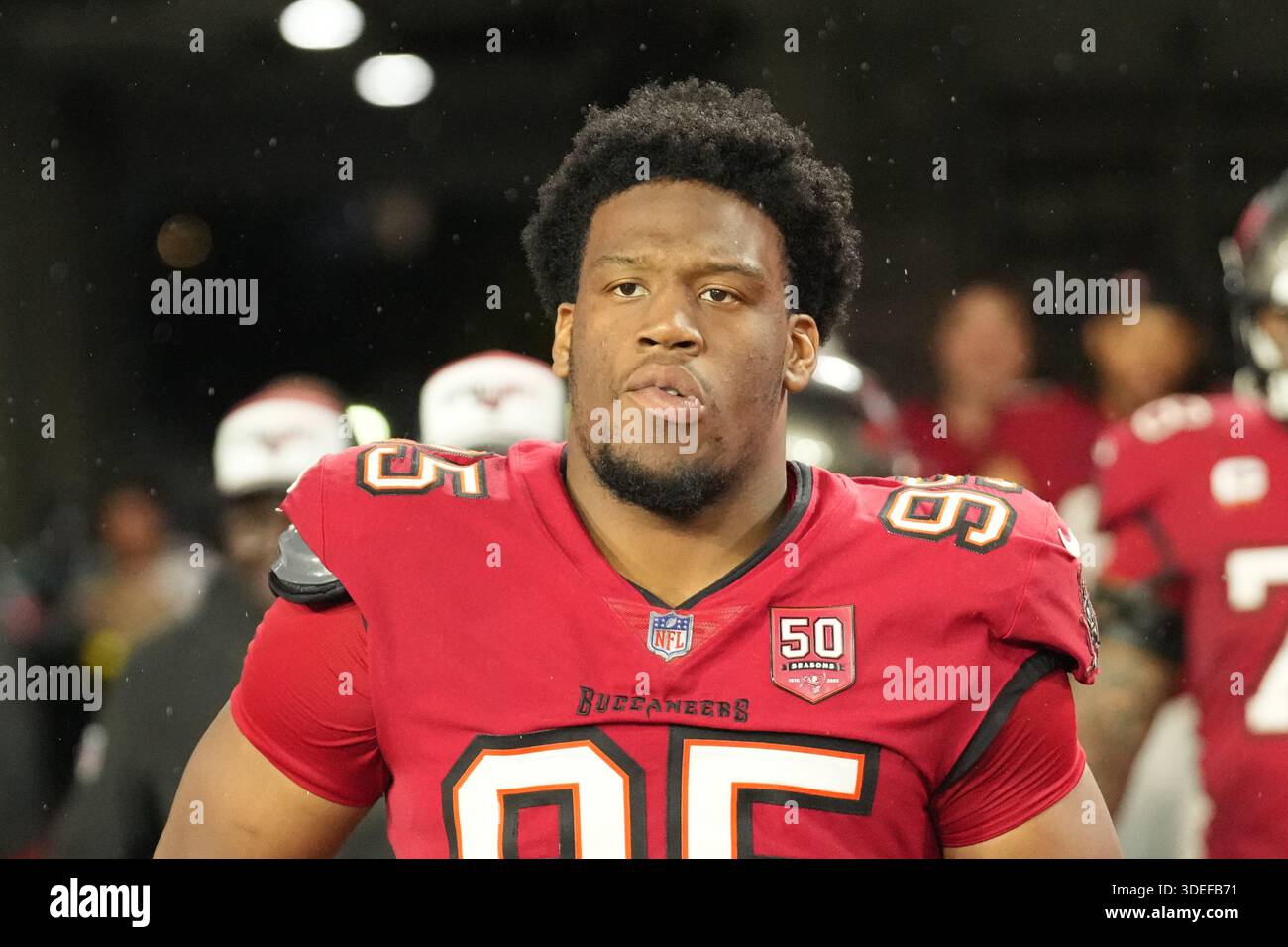 Tampa Bay Buccaneers defensive end Elijah Roberts (95) enters the field ...