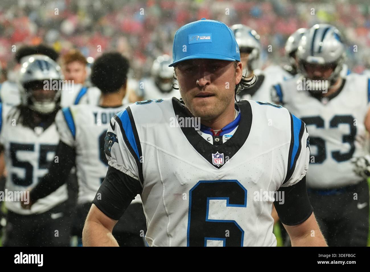 Carolina Panthers punter Sam Martin (6) goes to the locker room at half ...
