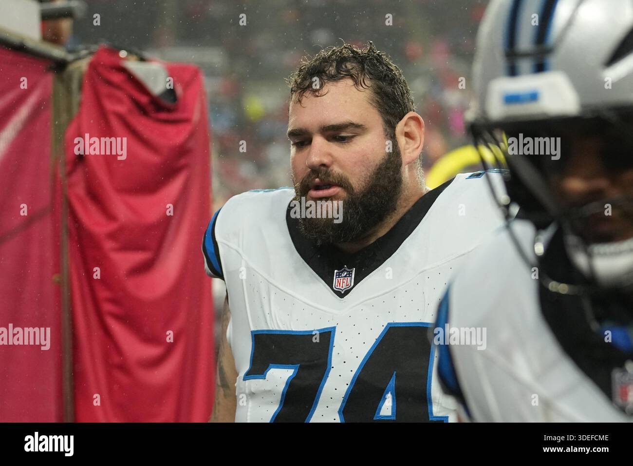 Carolina Panthers guard Jake Curhan (74) goes to the locker room at ...