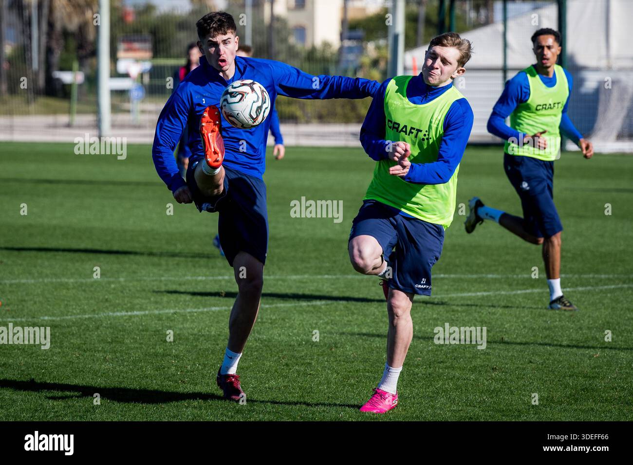Gent's Maksim Paskotsi and Gent's Max Dean fight for the ball during ...