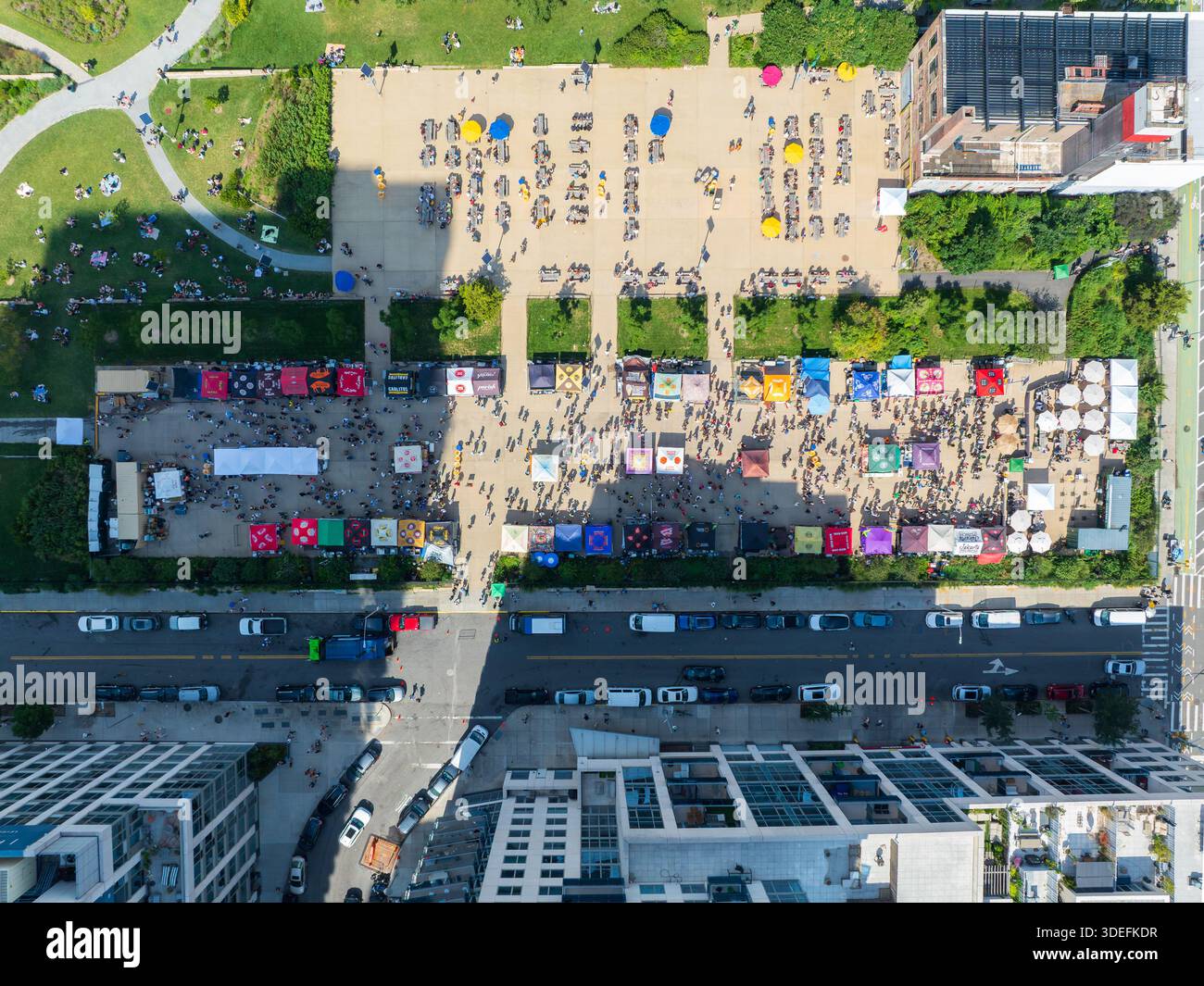 Aerial view of a vibrant market day at Marsha P Johnson Park, where ...