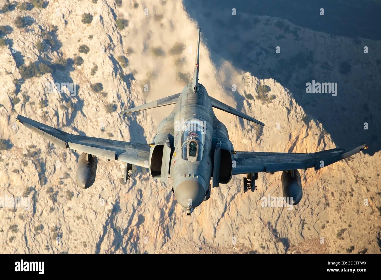 The Greek Air Force F-4E Phantom II is shown in an air-to-air ...