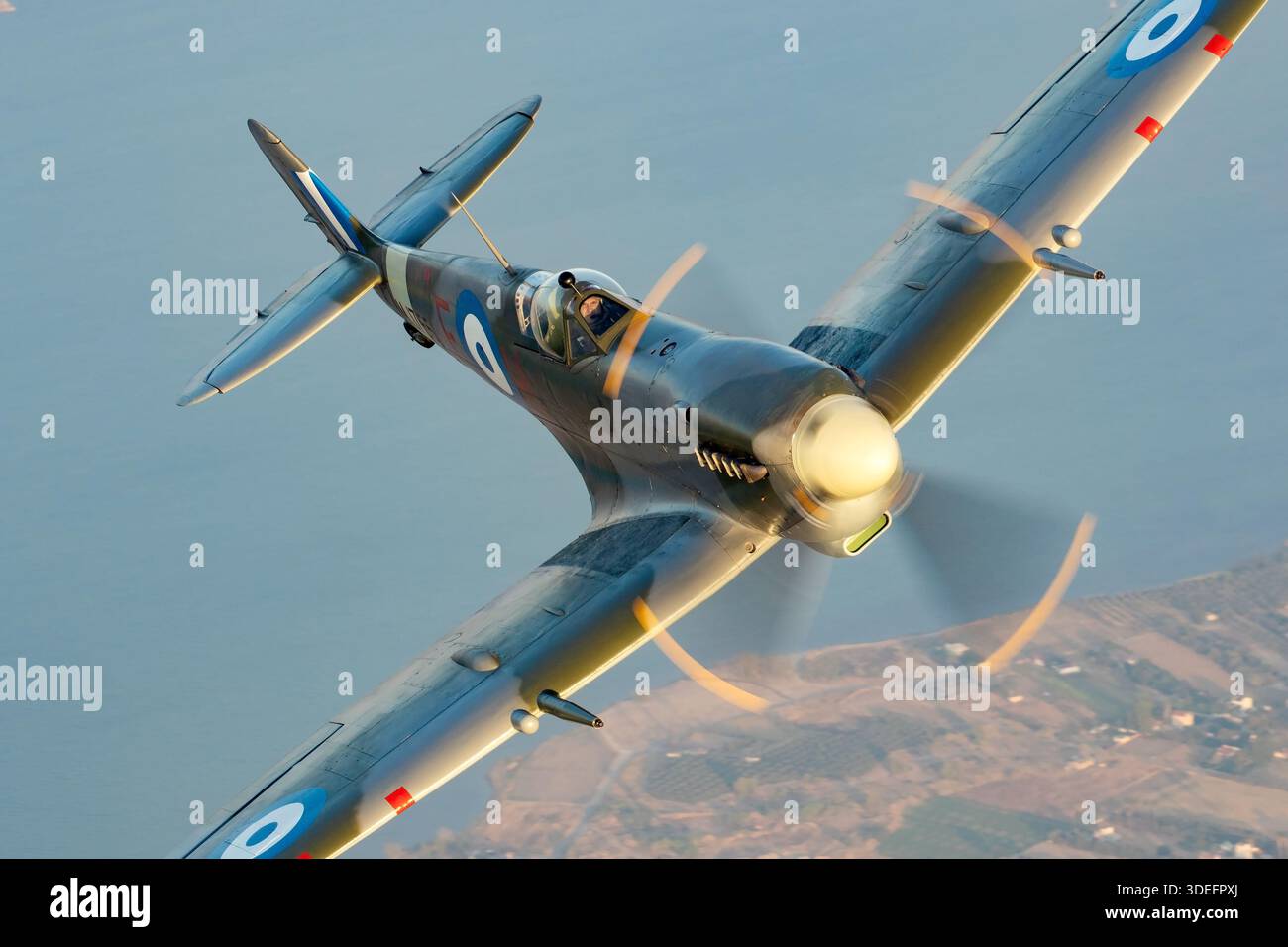 The image shows a Greek Air Force Supermarine Spitfire Mk.361 in air-to ...