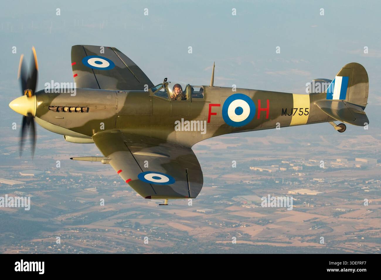 The photograph features a Greek Air Force Supermarine Spitfire Mk.361 ...