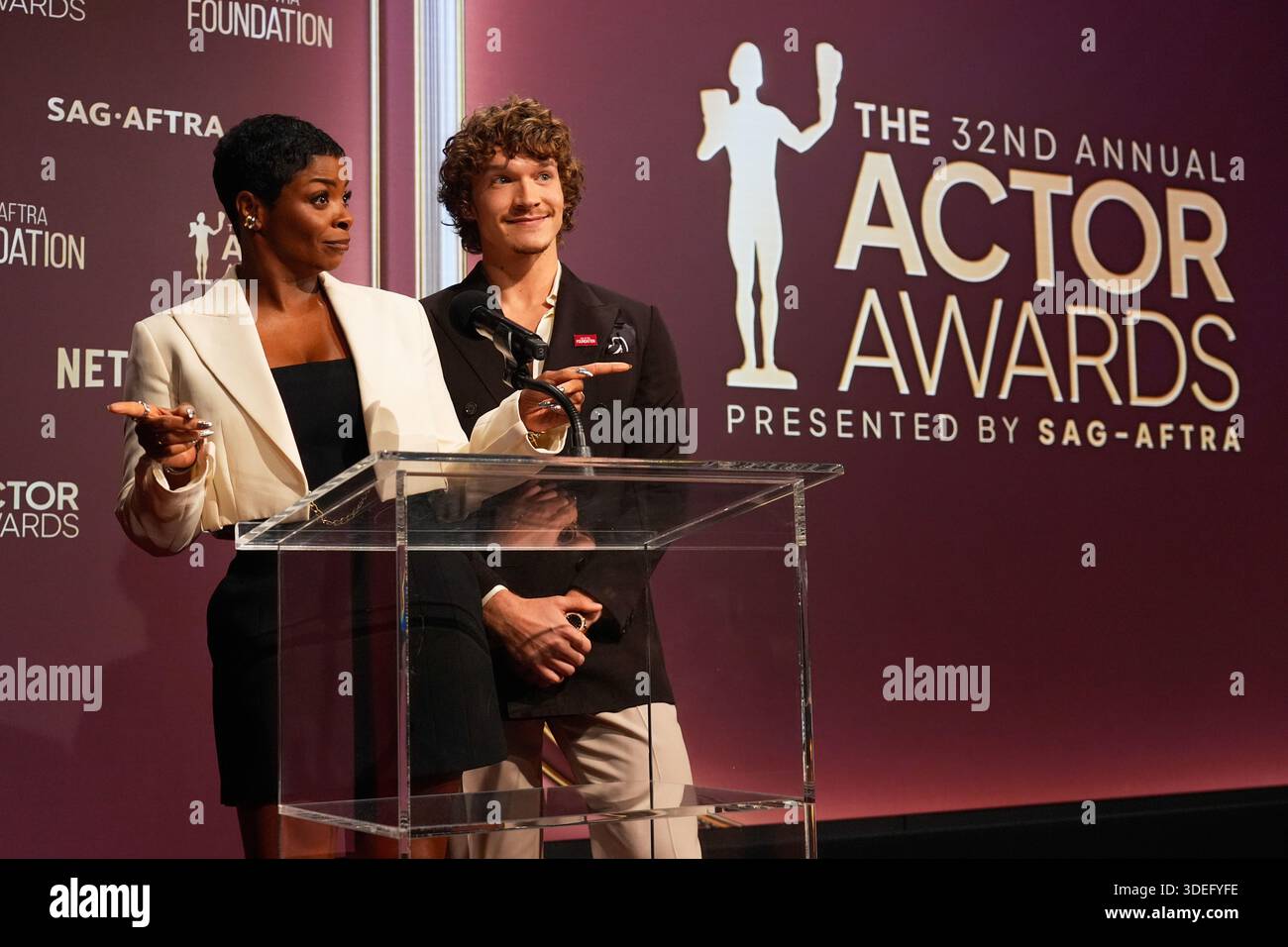 Janelle James, left, and Connor Storrie present the nominees for the ...