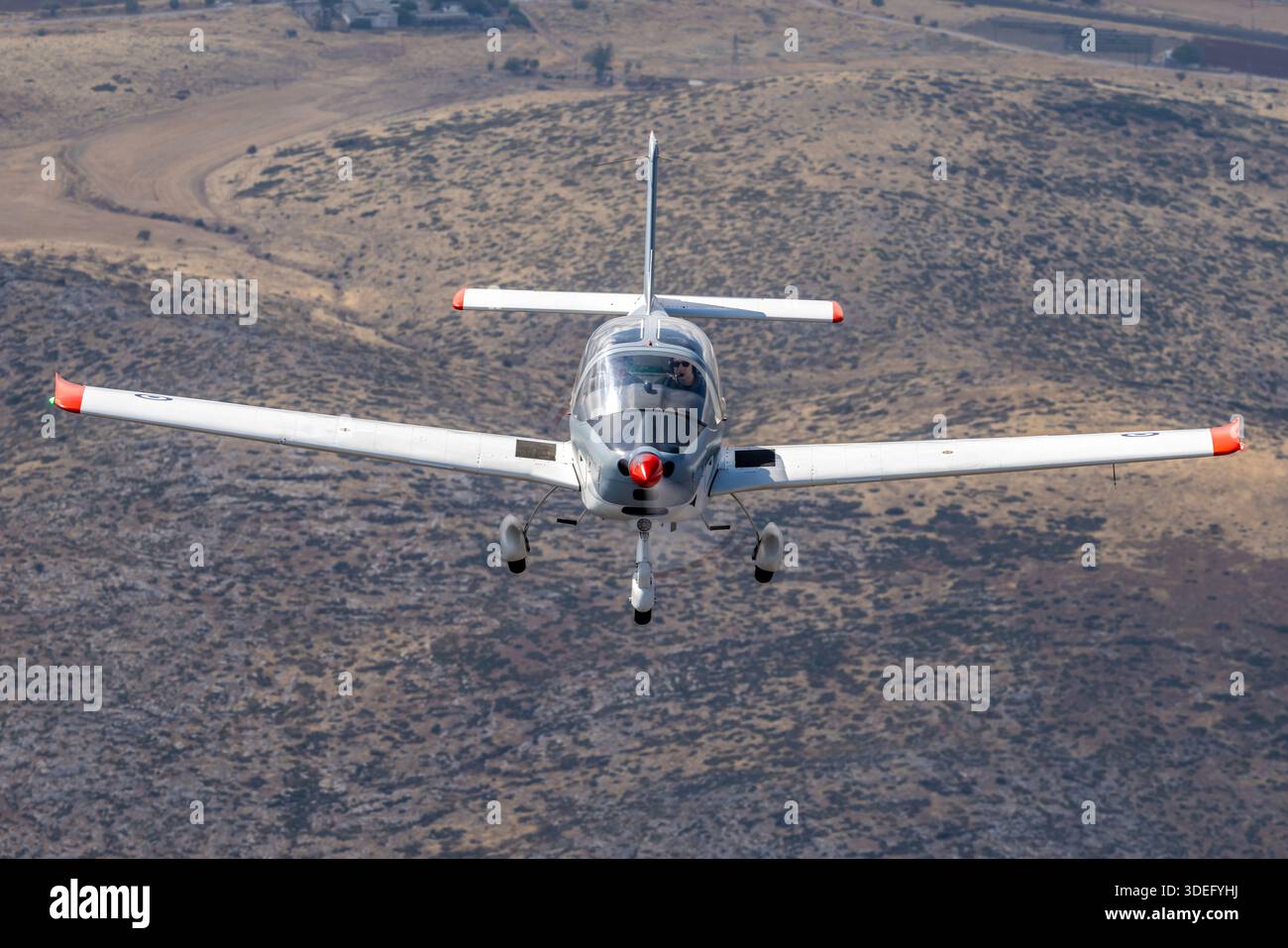 The image features a Hellenic Air Force Tecnam P-2002JF Sierra trainer ...