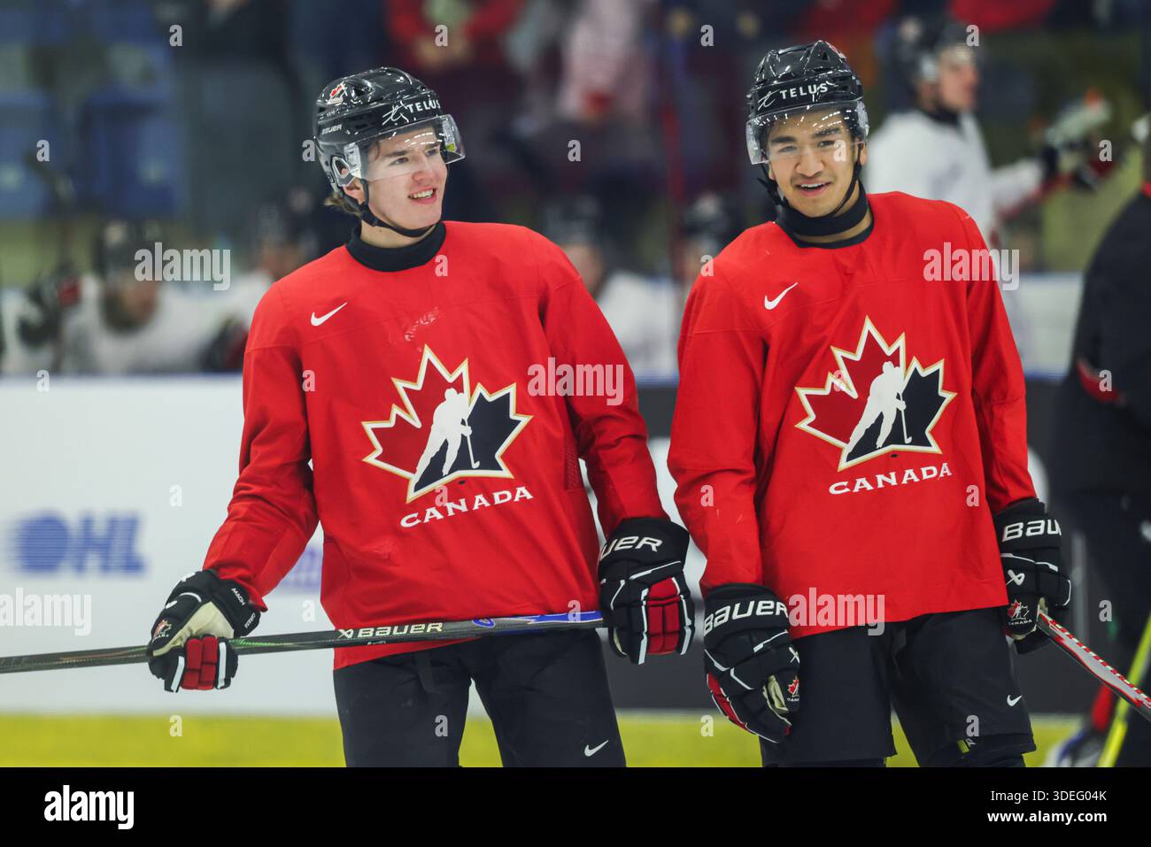 Braeden Cootes, left, of Sherwood Park, Alta., talks with Zayne Parekh ...