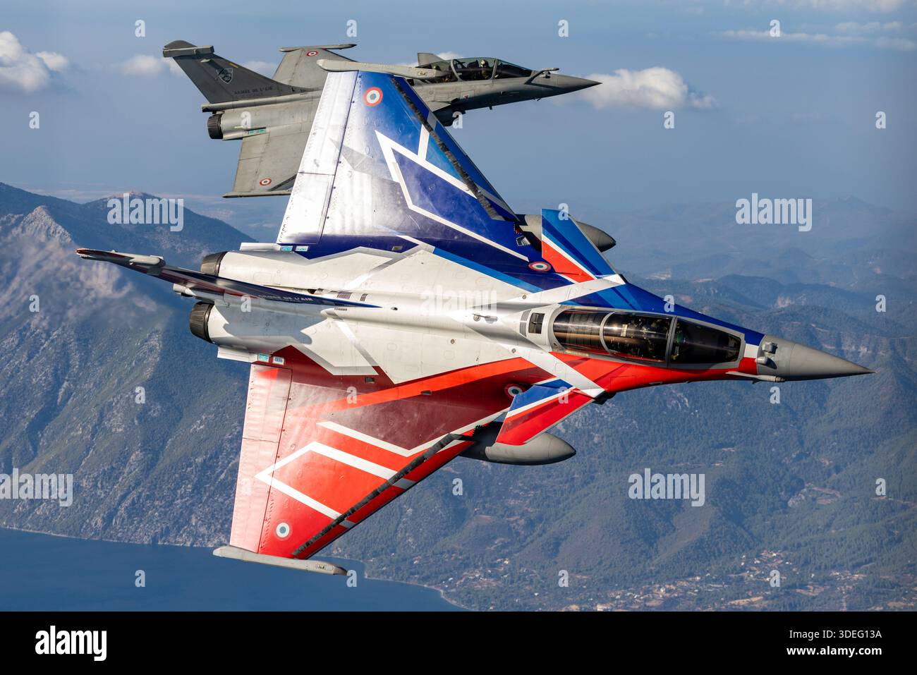 The French Air Force Rafale C and Rafale B are photographed banking ...