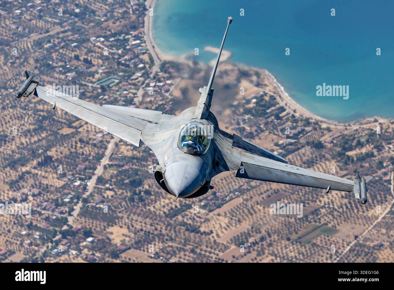A Greek Air Force General Dynamics F-16C Fighting Falcon is flying in ...