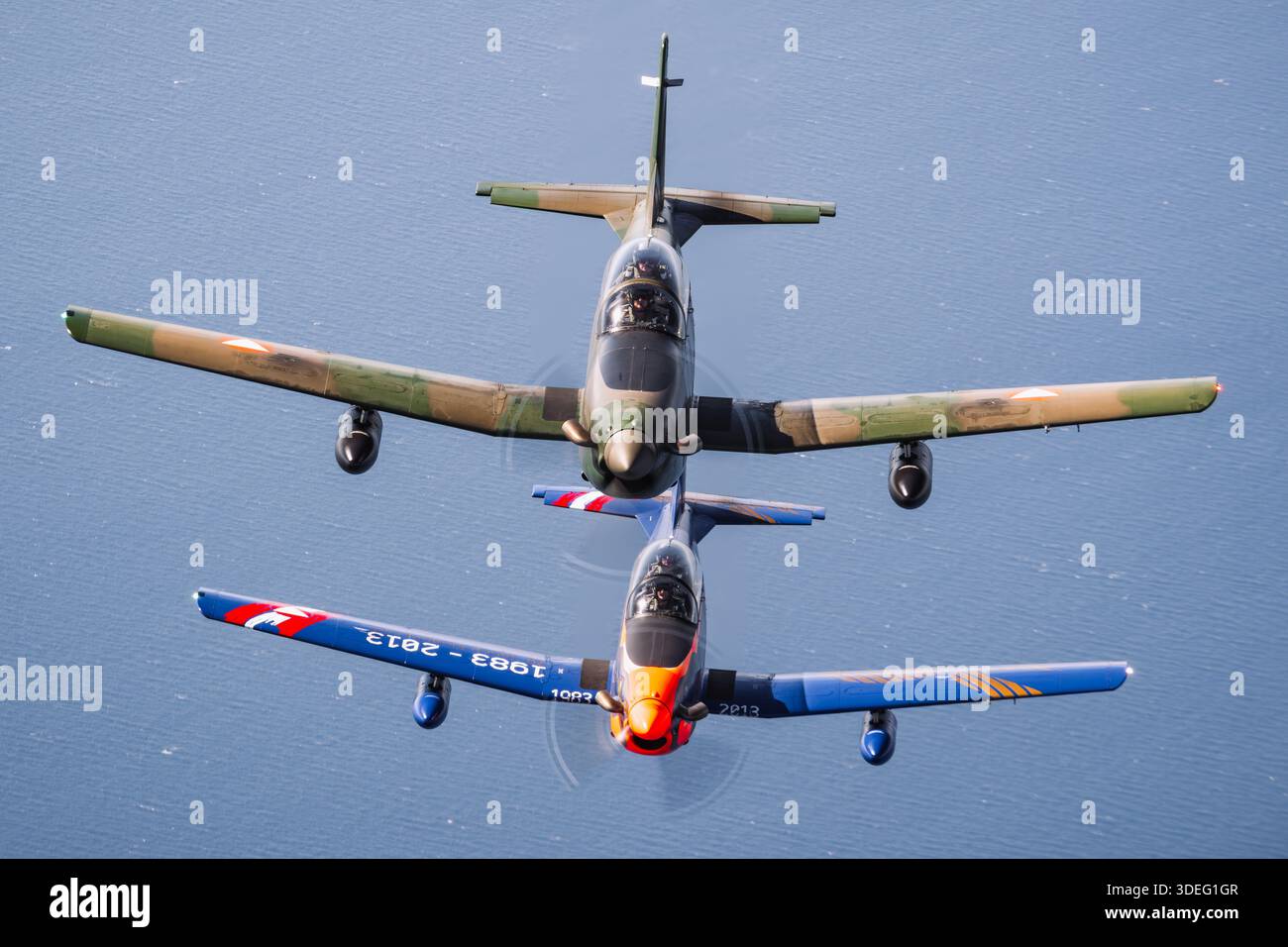 Close-up pilot view of two Austrian Air Force Pilatus PC-7 trainers ...