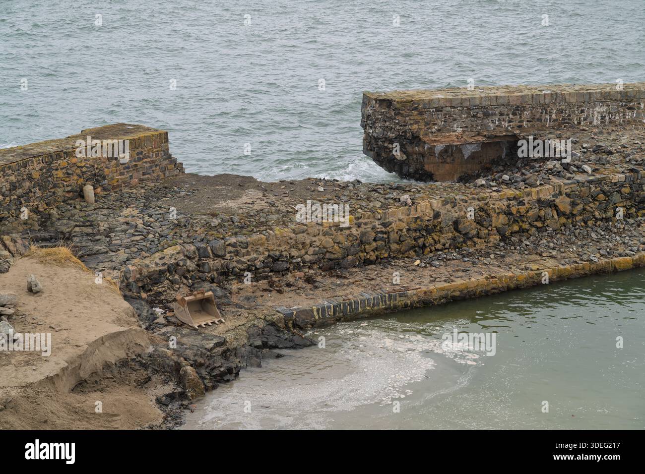 Severe damage is visible on the exterior wall of the old part of ...