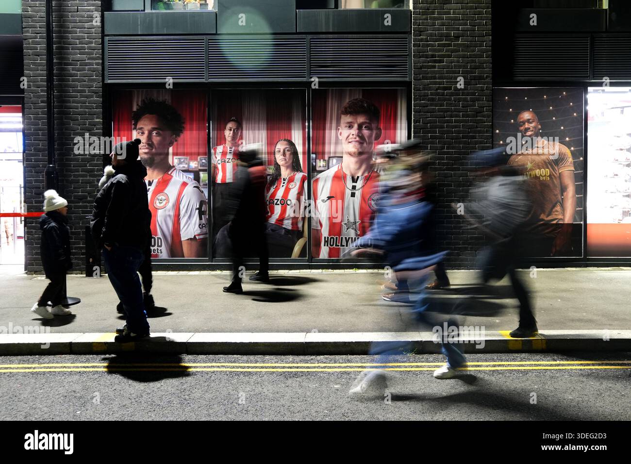 Fans arrive ahead of the Premier League match at Gtech Community ...