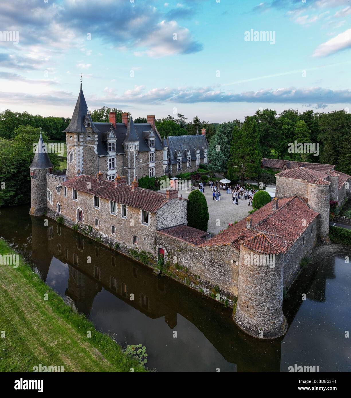 Aerial view of the Château d'Anjou, a medieval castle surrounded by a ...