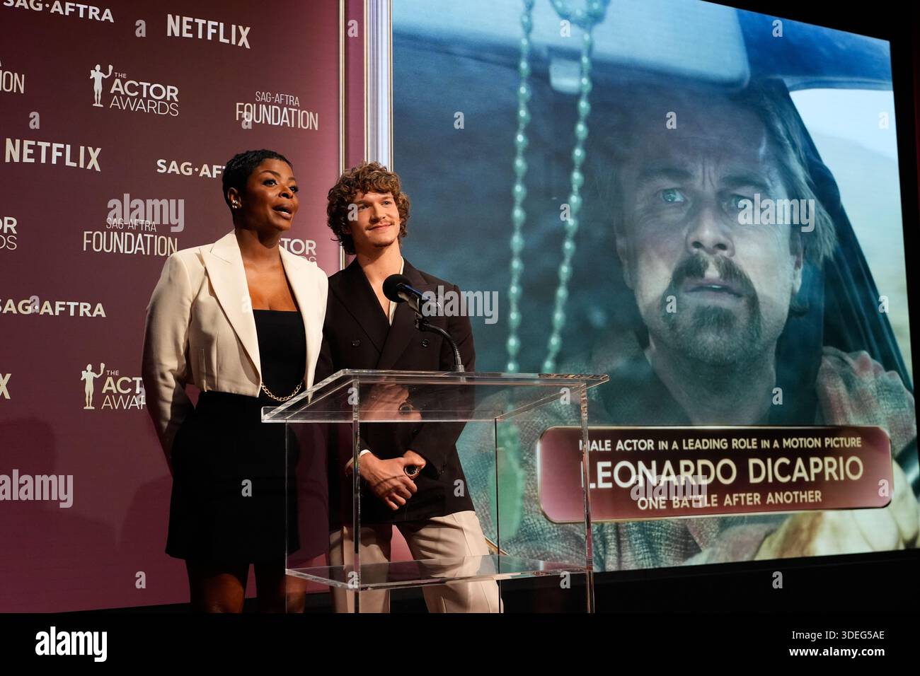Janelle James, left, and Connor Storrie present the nominees for the ...