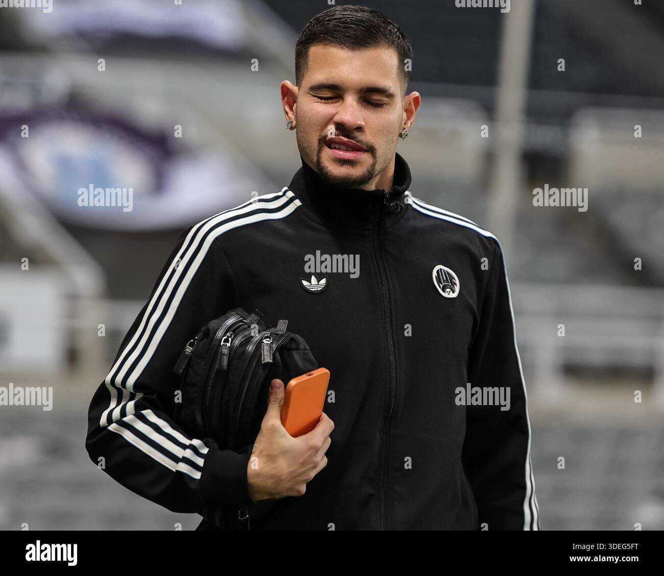 Bruno Guimaraes of Newcastle Untied winks as he arrives during the ...