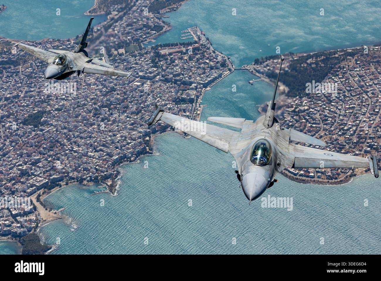 Greek Air Force F-16C Fighting Falcon jets fly in close formation ...