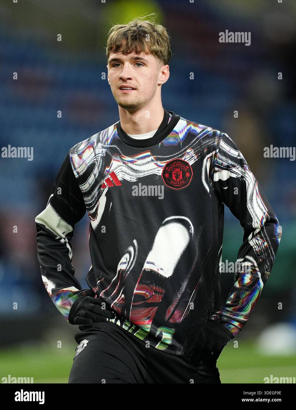 Manchester United's Jack Fletcher warms up ahead of the Premier League ...