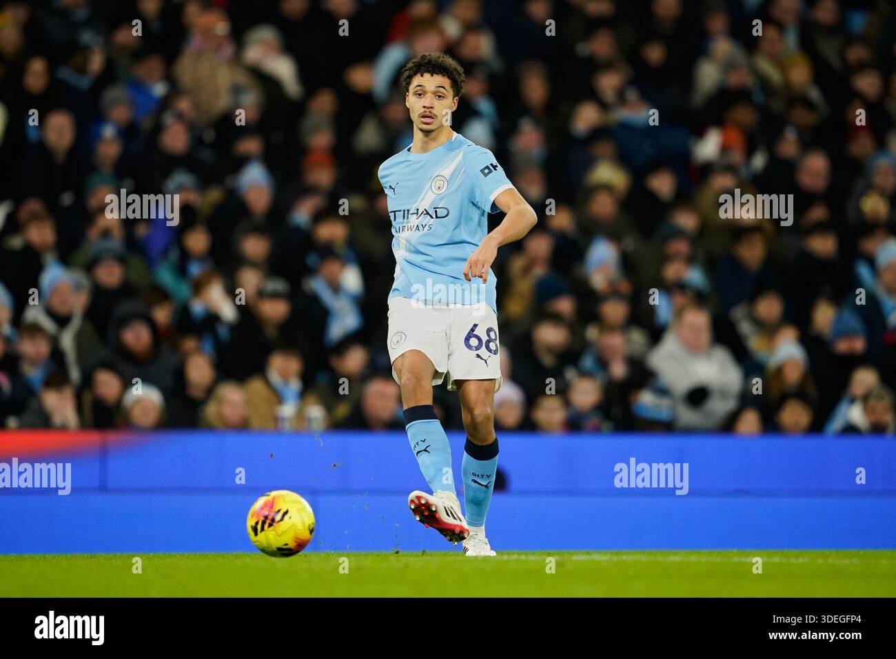 Manchester City's Max Alleyne runs with the ball during the English ...