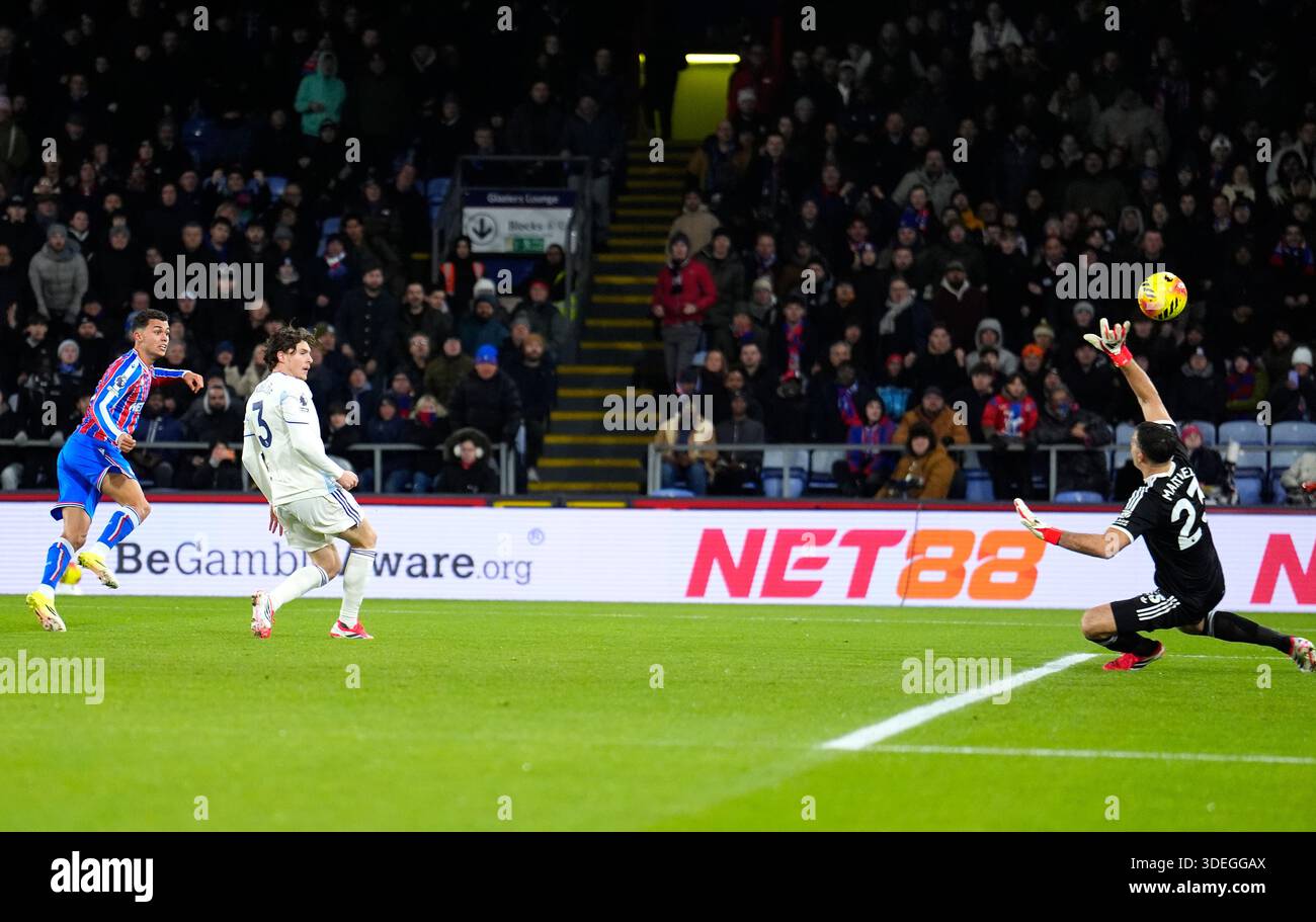 Crystal Palace's Brennan Johnson (left) attempts a shot towards goal ...