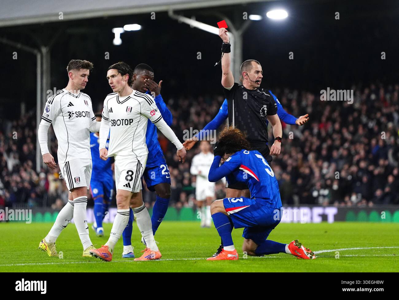 Chelsea's Marc Cucurella is dismissed after being shown a red card ...