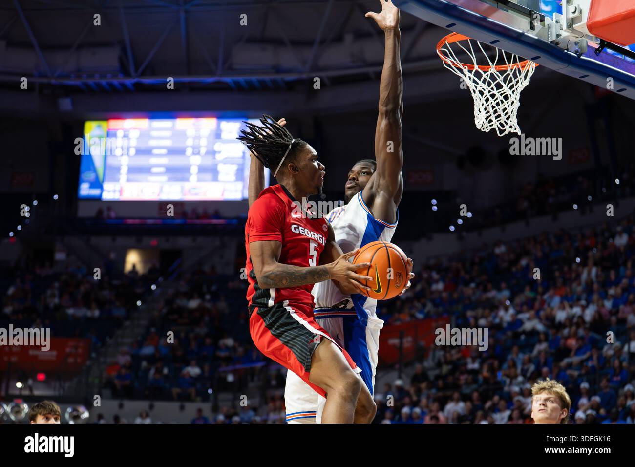 Georgia guard Jeremiah Wilkinson (5) gets ready to attempt a layup as ...