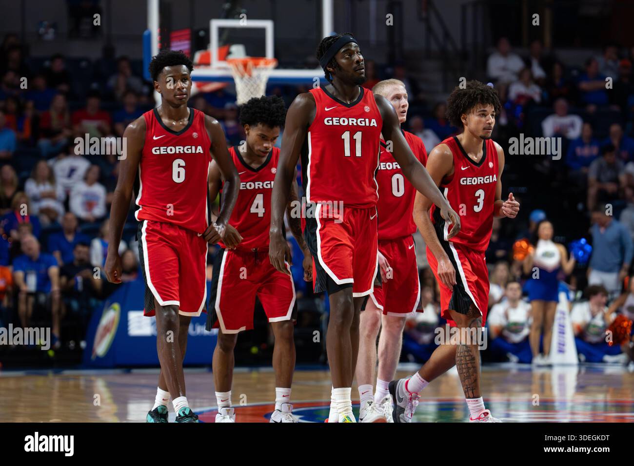 Georgia forward Kanon Catchings (6), forward Dylan James (11) and ...
