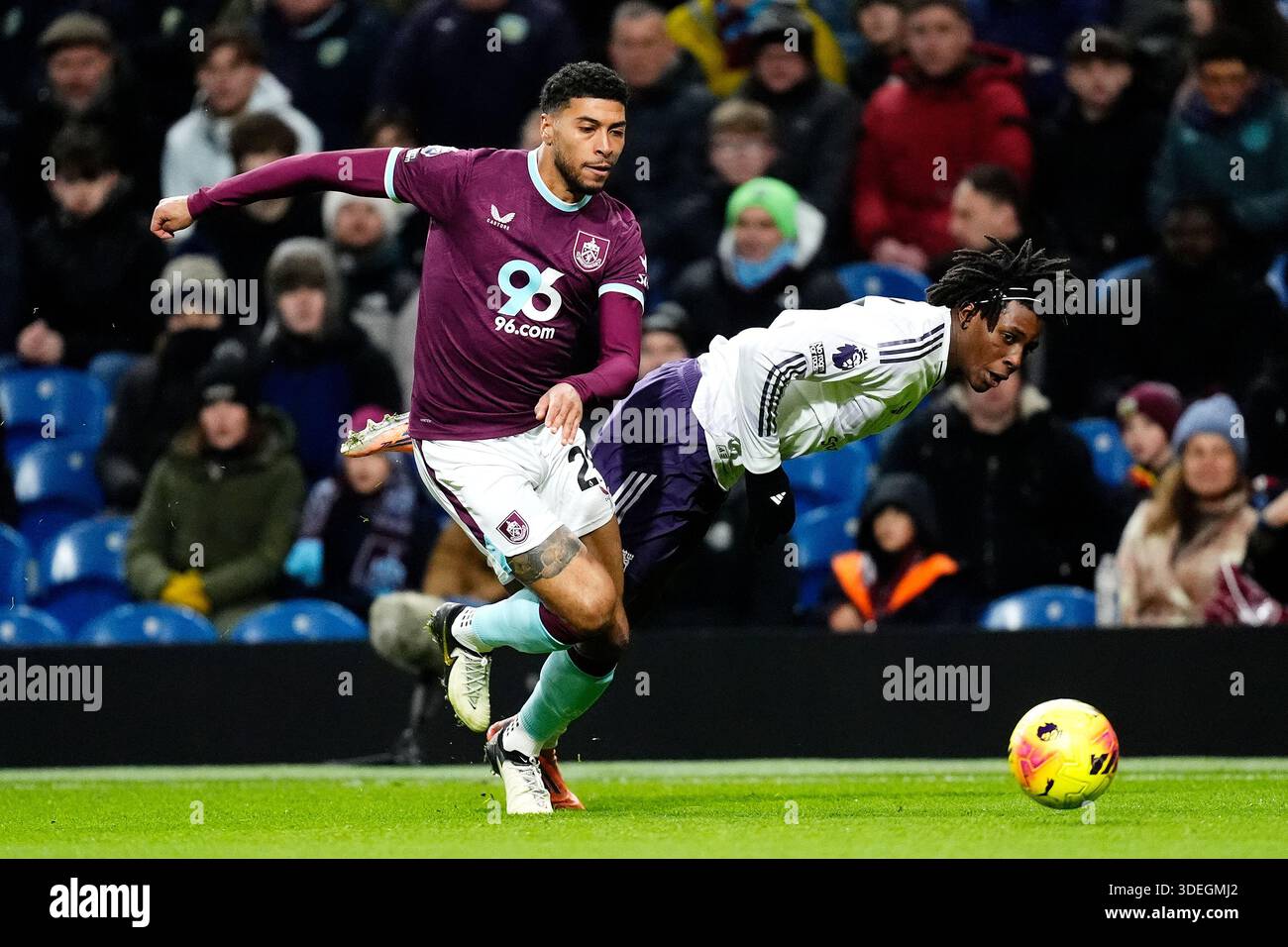 Burnley's Josh Laurent (left) and Manchester United's Patrick Dorgu ...