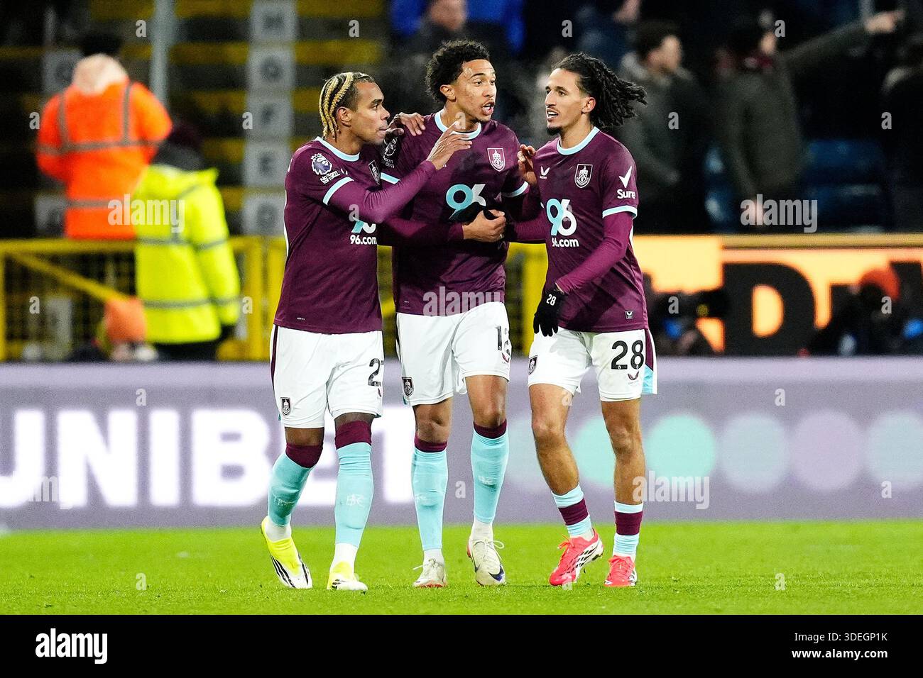 Burnley's Bashir Humphreys (centre) celebrates with team-mates after ...