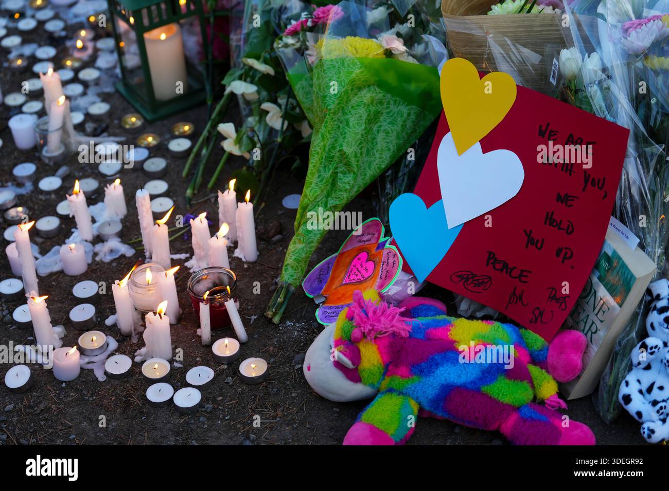 Candles burn at a memorial for the Lapu Lapu Day block party tragedy in ...