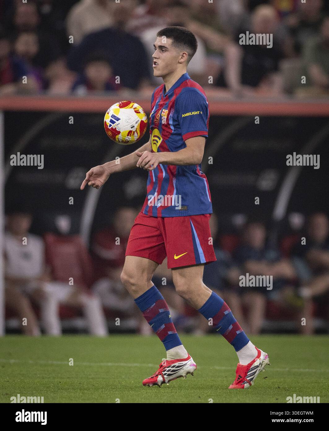Pau Cubarsi of Barcelona controls the ball during a Spanish Supercup ...