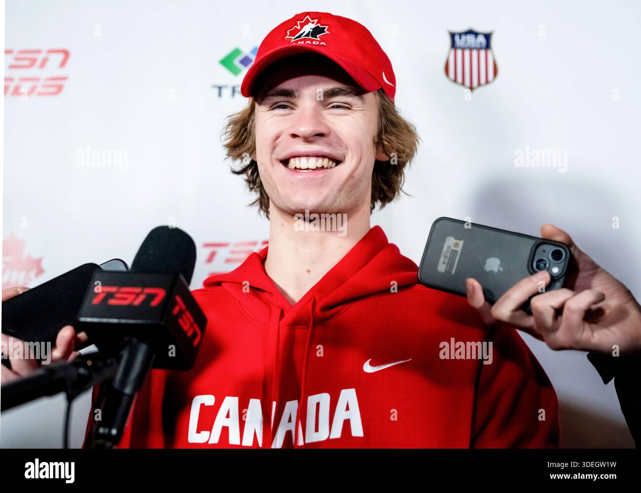 Canadian forward Gavin McKenna speaks to media following practice at ...