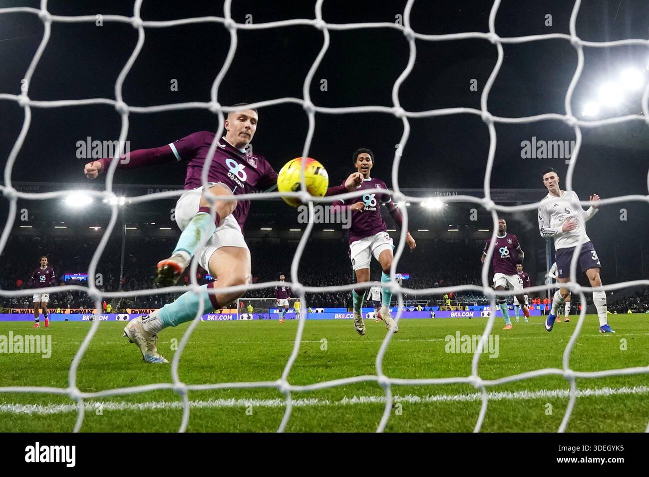 Burnley's Maxime Esteve clears the ball off the line from Manchester ...