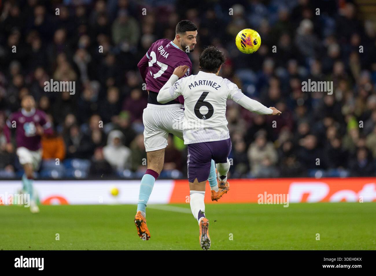 Armando Broja #27 of Burnley F.C heads the ball during the Premier ...