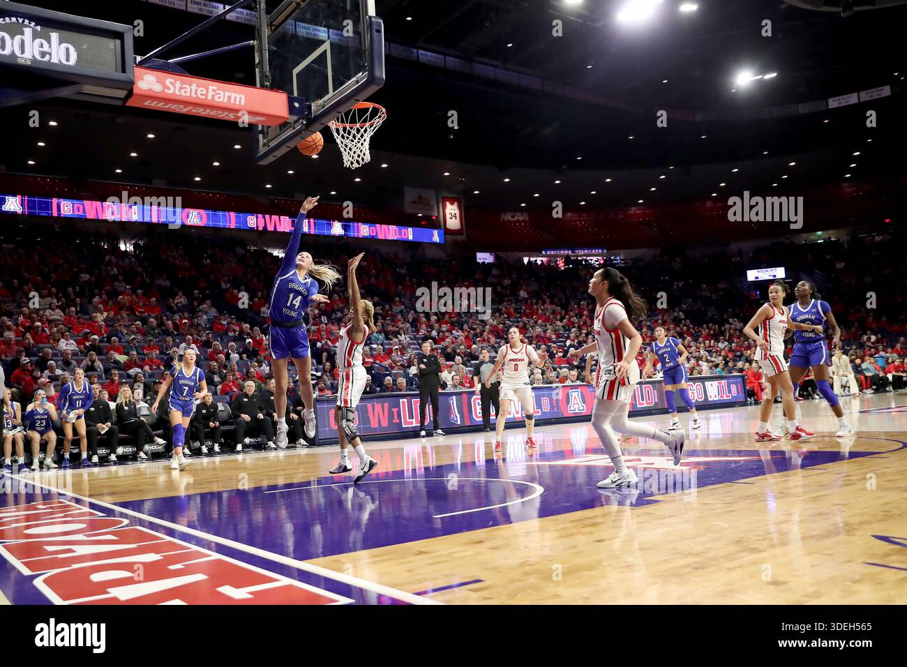 TUCSON, AZ - JANUARY 06: BYU Cougars guard Kambree Barber (14) shoots ...