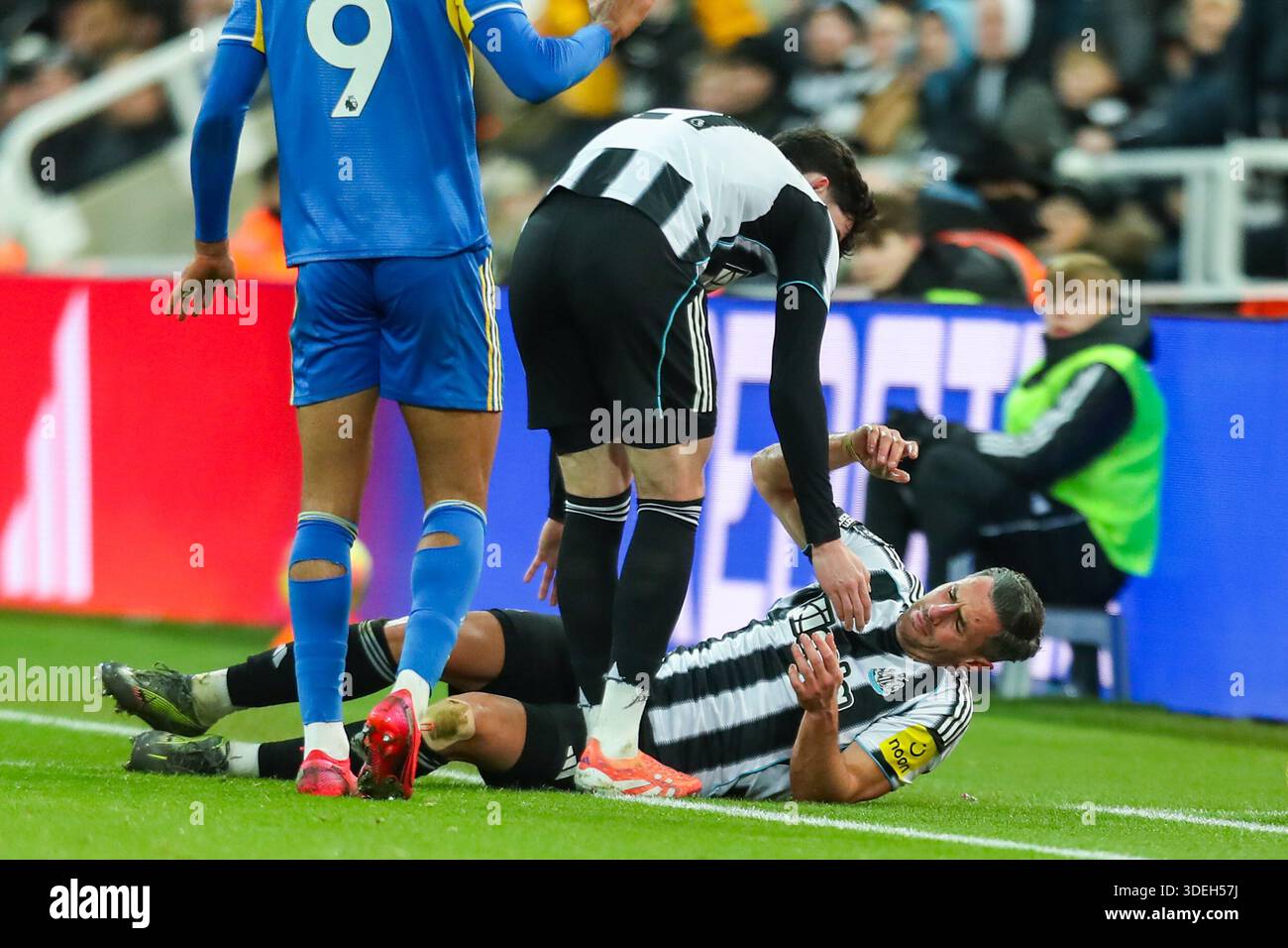 Fabian Schär Of Newcastle United goes down injured during the Newcastle ...