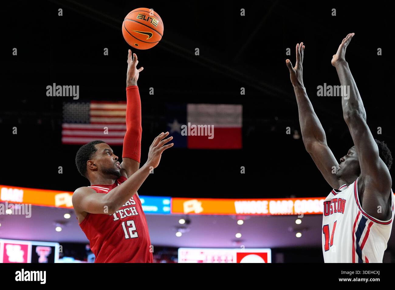Texas Tech forward Donovan Atwell (12) shoots against Houston forward ...