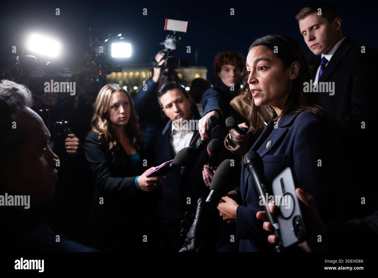 Rep. Alexandria Ocasio-Cortez (D-N.Y.) speaks with reporters outside ...