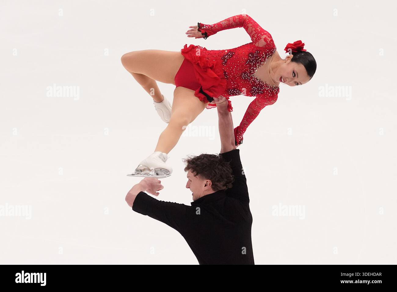 Naomi Williams and Lachlan Lewer compete during the pairs short program ...