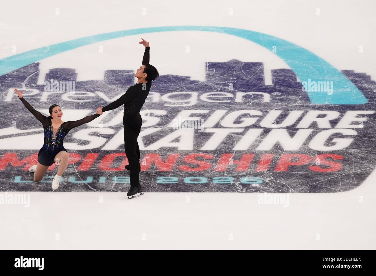 Olivia Flores and Luke Wang compete during the pairs short program at ...