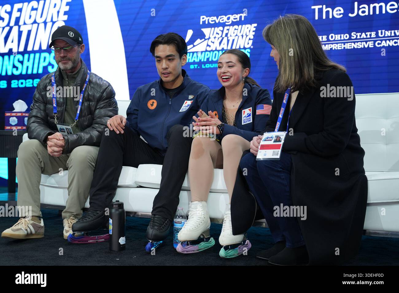 Olivia Flores and Luke Wang watch for results after competing during ...
