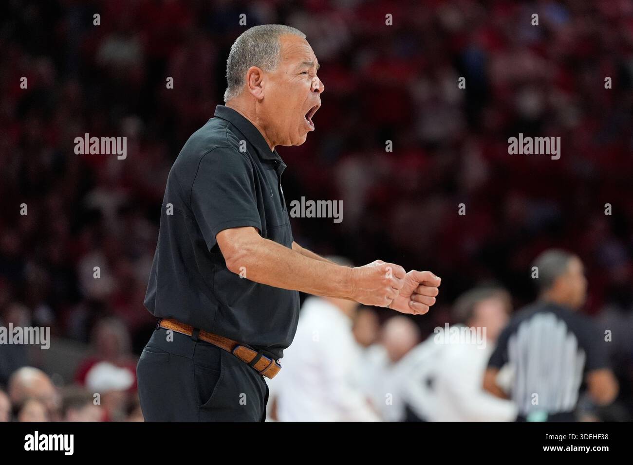 during the first half of an NCAA college basketball game in Houston ...