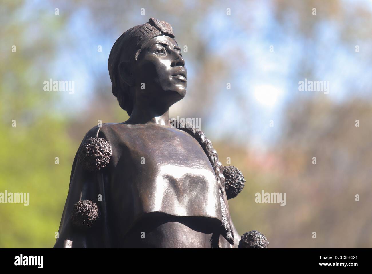 A bronze statue of an indigenous woman is seen during the unveiling ...