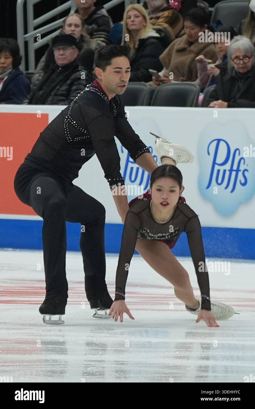 Emily Chan and Spencer Akira Howe fall while competing during the pairs ...